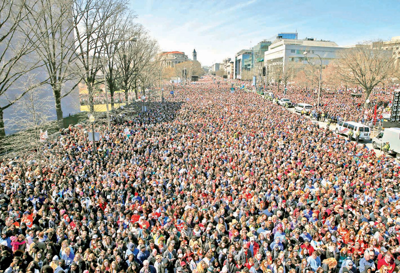 A grand rally in US cities urging to impose restrictions on guns ...